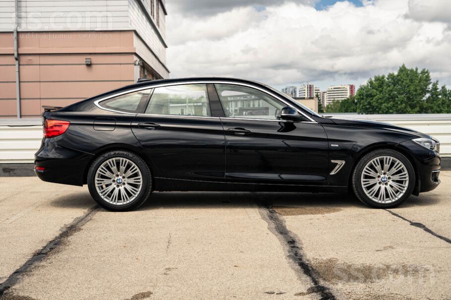 Black BMW 320 2013 in Riga, with an engine capacity of 2.00 L and mileage of 235 thousand km for 11990 €, photo 8 on AUTOMOTO.COM.LV