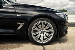 Black BMW 320 2013 in Riga, with an engine capacity of 2.00 L and mileage of 235 thousand km for 11990 €, photo 9 on AUTOMOTO.COM.LV