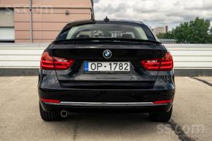 Black BMW 320 2013 in Riga, with an engine capacity of 2.00 L and mileage of 235 thousand km for 11990 €, photo 10 on AUTOMOTO.COM.LV