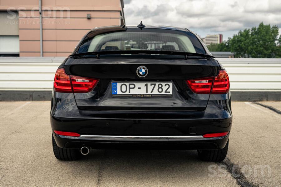 Black BMW 320 2013 in Riga, with an engine capacity of 2.00 L and mileage of 235 thousand km for 11990 €, photo 10 on AUTOMOTO.COM.LV