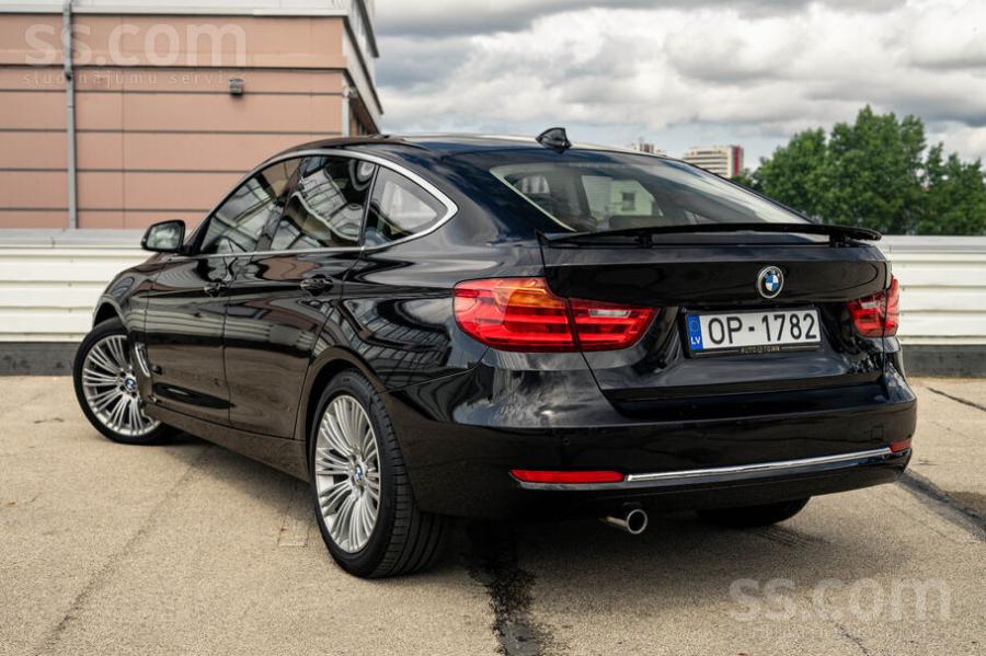 Black BMW 320 2013 in Riga, with an engine capacity of 2.00 L and mileage of 235 thousand km for 11990 €, photo 11 on AUTOMOTO.COM.LV