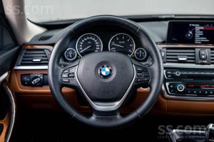 Black BMW 320 2013 in Riga, with an engine capacity of 2.00 L and mileage of 235 thousand km for 11990 €, photo 16 on AUTOMOTO.COM.LV