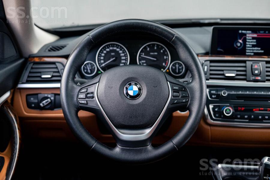 Black BMW 320 2013 in Riga, with an engine capacity of 2.00 L and mileage of 235 thousand km for 11990 €, photo 16 on AUTOMOTO.COM.LV