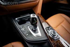 Black BMW 320 2013 in Riga, with an engine capacity of 2.00 L and mileage of 235 thousand km for 11990 €, photo 24 on AUTOMOTO.COM.LV