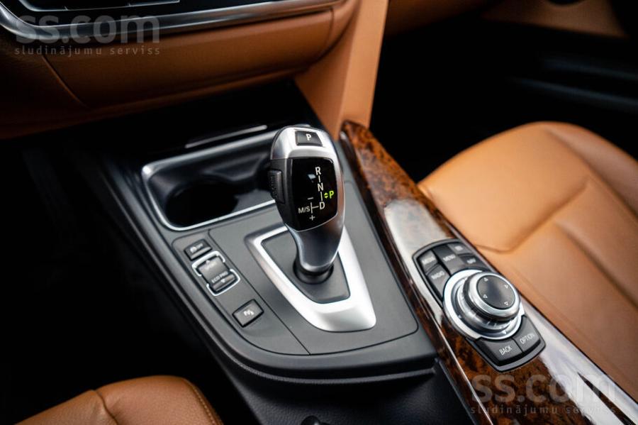 Black BMW 320 2013 in Riga, with an engine capacity of 2.00 L and mileage of 235 thousand km for 11990 €, photo 24 on AUTOMOTO.COM.LV