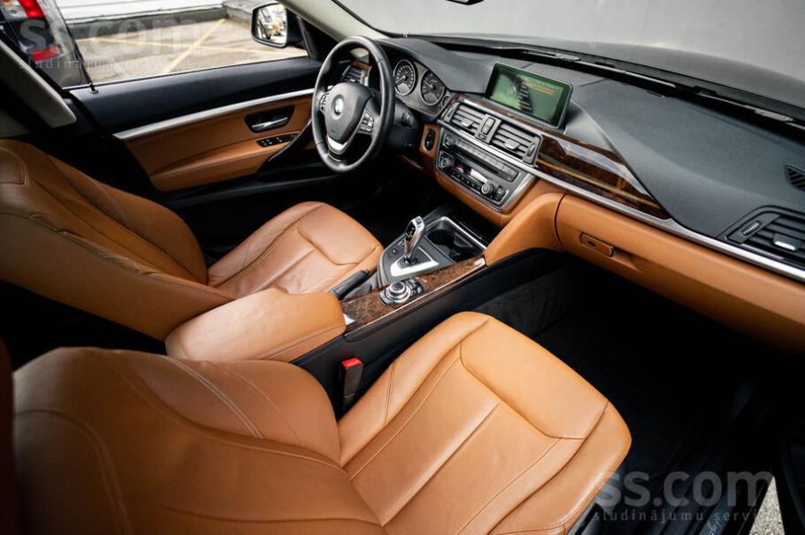 Black BMW 320 2013 in Riga, with an engine capacity of 2.00 L and mileage of 235 thousand km for 11990 €, photo 30 on AUTOMOTO.COM.LV