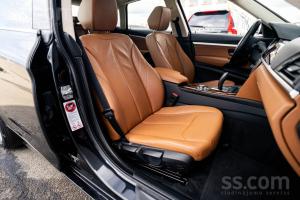 Black BMW 320 2013 in Riga, with an engine capacity of 2.00 L and mileage of 235 thousand km for 11990 €, photo 31 on AUTOMOTO.COM.LV