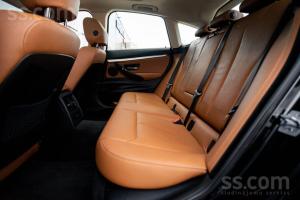 Black BMW 320 2013 in Riga, with an engine capacity of 2.00 L and mileage of 235 thousand km for 11990 €, photo 33 on AUTOMOTO.COM.LV