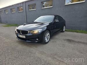 Black BMW 320 2014 in Ogre, with an engine capacity of 2.00 L and mileage of 295 thousand km for 10290 €, photo 1 on AUTOMOTO.COM.LV