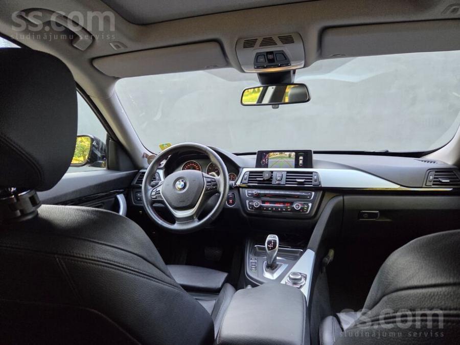 Black BMW 320 2014 in Ogre, with an engine capacity of 2.00 L and mileage of 295 thousand km for 10290 €, photo 7 on AUTOMOTO.COM.LV