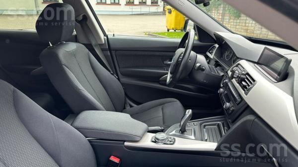 Black BMW 320 2014 in Riga, with an engine capacity of 2.00 L and mileage of 287 thousand km for 9300 €, photo 8 on AUTOMOTO.COM.LV