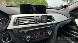 Black BMW 320 2014 in Riga, with an engine capacity of 2.00 L and mileage of 287 thousand km for 9300 €, photo 13 on AUTOMOTO.COM.LV