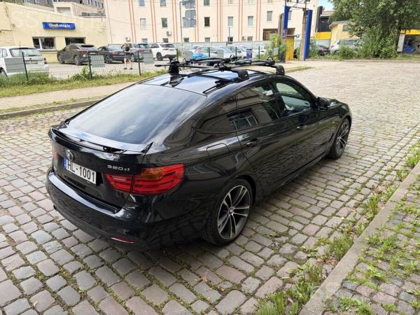 Black BMW 320 2014 in Riga, with an engine capacity of 2.00 L and mileage of 346 thousand km for 14550 €, photo 3 on AUTOMOTO.COM.LV