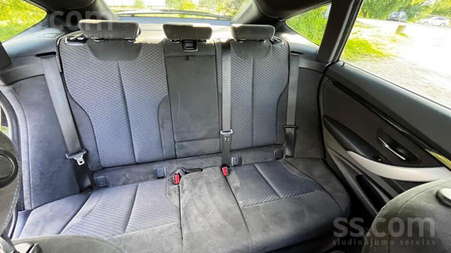 Black BMW 320 2014 in Liepaja, with an engine capacity of 2.00 L and mileage of 260 thousand km for 14500 €, photo 13 on AUTOMOTO.COM.LV
