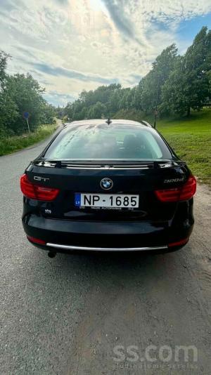 Black BMW 320 2014 in Riga, with an engine capacity of 2.00 L and mileage of 286 thousand km for 11800 €, photo 4 on AUTOMOTO.COM.LV