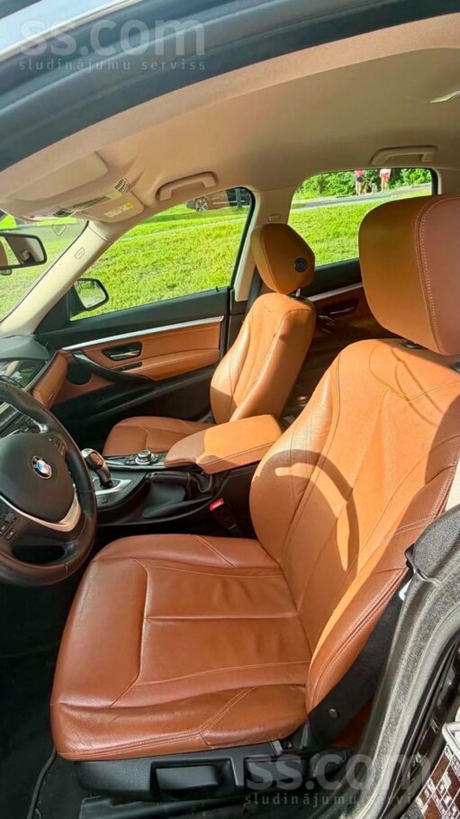 Black BMW 320 2014 in Riga, with an engine capacity of 2.00 L and mileage of 286 thousand km for 11800 €, photo 7 on AUTOMOTO.COM.LV