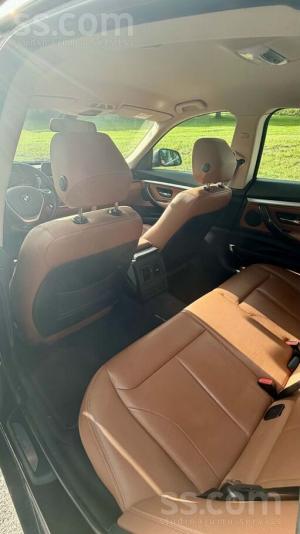 Black BMW 320 2014 in Riga, with an engine capacity of 2.00 L and mileage of 286 thousand km for 11800 €, photo 8 on AUTOMOTO.COM.LV