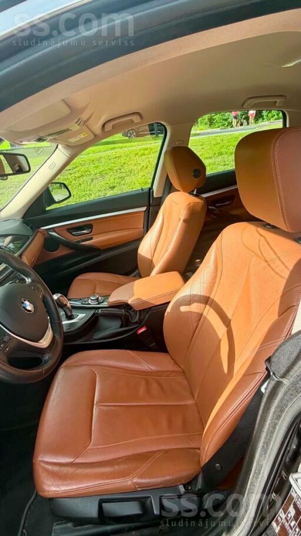 Black BMW 320 2014 in Riga, with an engine capacity of 2.00 L and mileage of 286 thousand km for 11800 €, photo 6 on AUTOMOTO.COM.LV