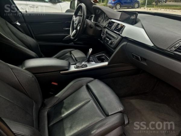 Melns BMW 320 2015 Rīga, ar dzinēja tilpumu 2.00 L un nobraukumu 318 tūkst. km par 13000 €, foto 7 vietnē AUTOMOTO.COM.LV