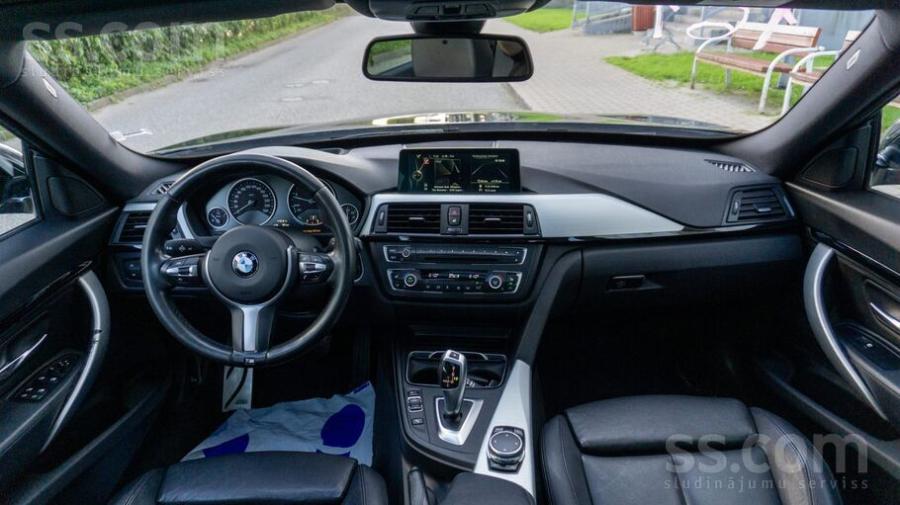 Black BMW 320 2015 in Riga, with an engine capacity of 2.00 L and mileage of 319 thousand km for 11590 €, photo 12 on AUTOMOTO.COM.LV