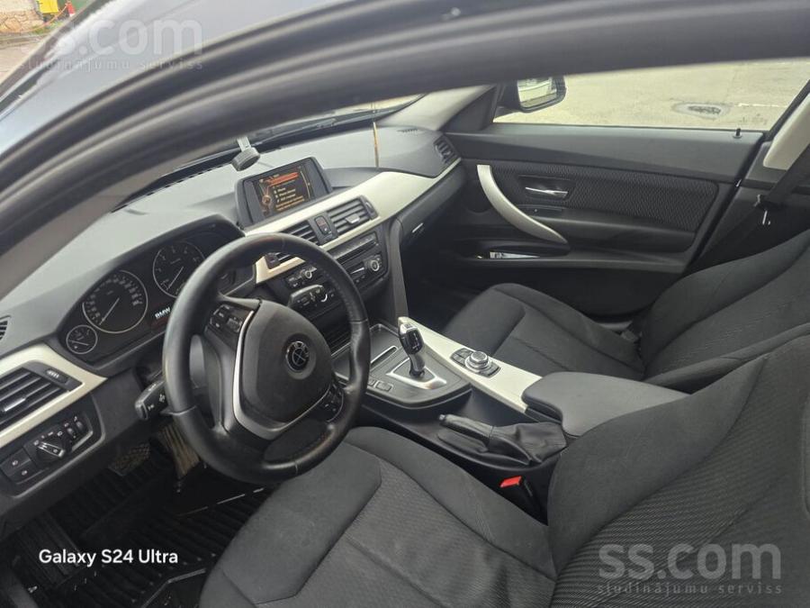 Black BMW 320 2016 in Riga, with an engine capacity of 2.00 L and mileage of 208 thousand km for 10100 €, photo 11 on AUTOMOTO.COM.LV