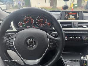 Black BMW 320 2016 in Riga, with an engine capacity of 2.00 L and mileage of 208 thousand km for 10100 €, photo 12 on AUTOMOTO.COM.LV