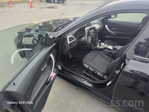 Black BMW 320 2016 in Riga, with an engine capacity of 2.00 L and mileage of 208 thousand km for 10100 €, photo 13 on AUTOMOTO.COM.LV