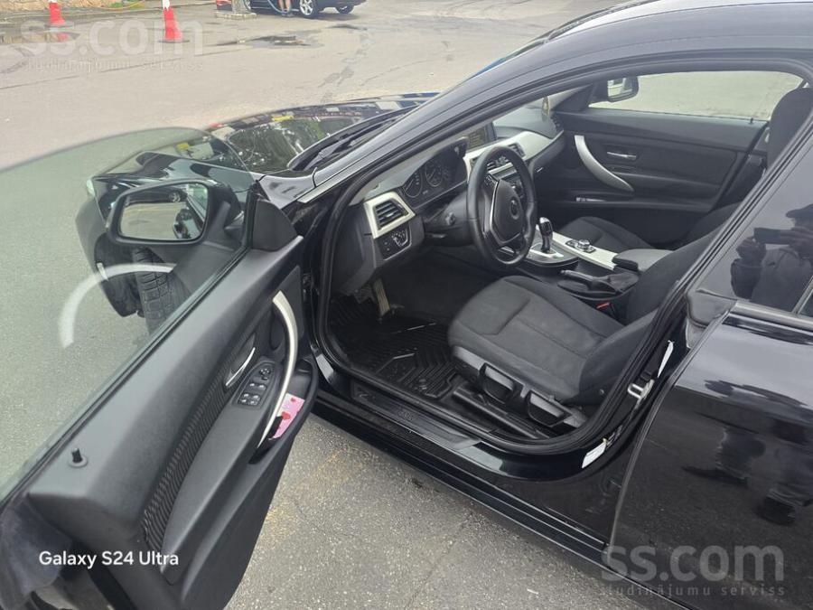 Black BMW 320 2016 in Riga, with an engine capacity of 2.00 L and mileage of 208 thousand km for 10100 €, photo 13 on AUTOMOTO.COM.LV