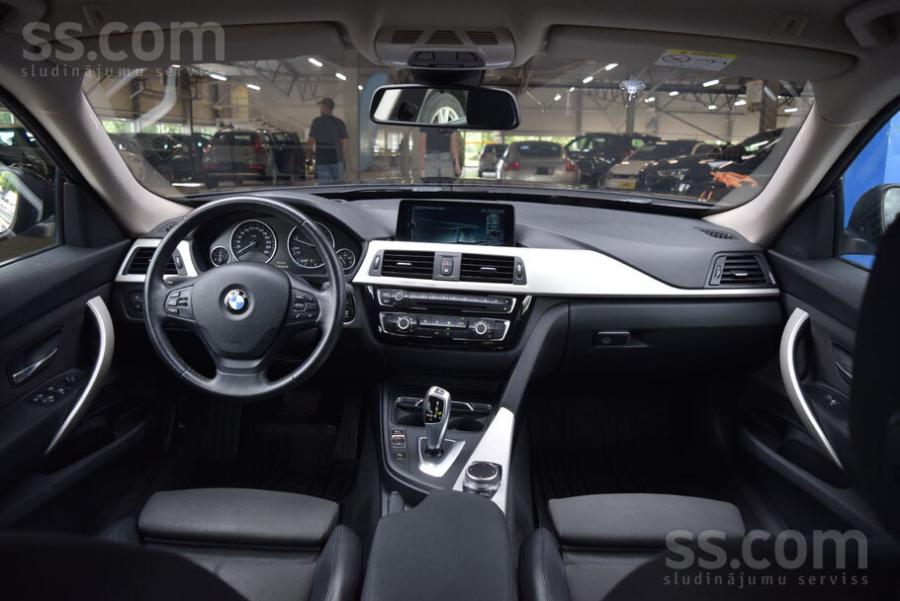 Black BMW 320 2017 in Riga, with an engine capacity of 2.00 L and mileage of 196 thousand km for 12500 €, photo 6 on AUTOMOTO.COM.LV