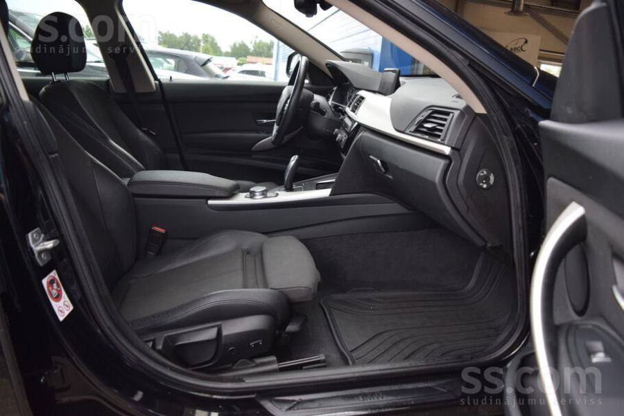 Black BMW 320 2017 in Riga, with an engine capacity of 2.00 L and mileage of 196 thousand km for 12500 €, photo 14 on AUTOMOTO.COM.LV