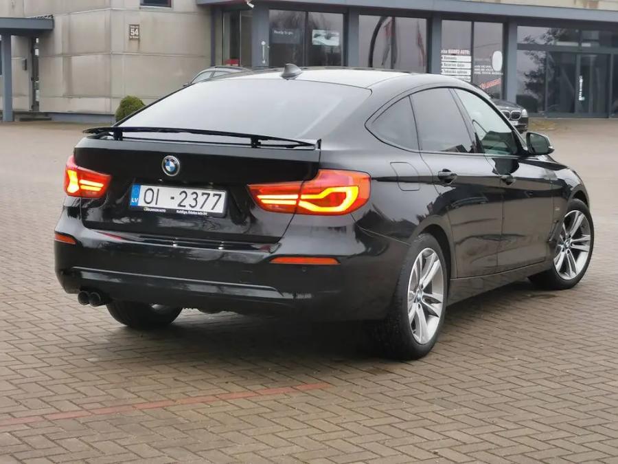 Black BMW 320 2018 in Kuldiga, with an engine capacity of 2.00 L and mileage of 222 thousand km for 14490 €, photo 3 on AUTOMOTO.COM.LV