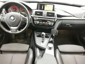 Black BMW 320 2018 in Kuldiga, with an engine capacity of 2.00 L and mileage of 222 thousand km for 14490 €, photo 11 on AUTOMOTO.COM.LV