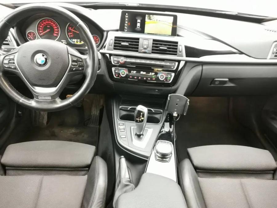 Black BMW 320 2018 in Kuldiga, with an engine capacity of 2.00 L and mileage of 222 thousand km for 14490 €, photo 11 on AUTOMOTO.COM.LV
