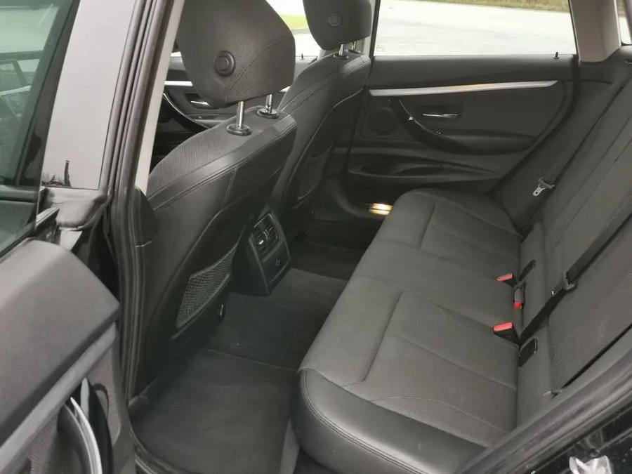 Black BMW 320 2018 in Kuldiga, with an engine capacity of 2.00 L and mileage of 222 thousand km for 14490 €, photo 12 on AUTOMOTO.COM.LV