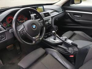 Black BMW 320 2018 in Kuldiga, with an engine capacity of 2.00 L and mileage of 222 thousand km for 14490 €, photo 13 on AUTOMOTO.COM.LV