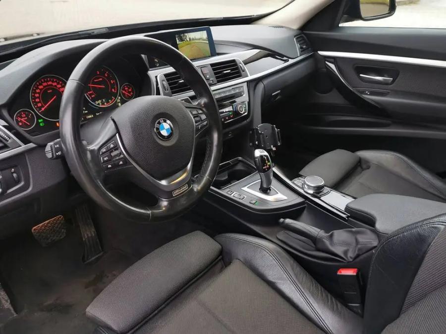 Black BMW 320 2018 in Kuldiga, with an engine capacity of 2.00 L and mileage of 222 thousand km for 14490 €, photo 13 on AUTOMOTO.COM.LV