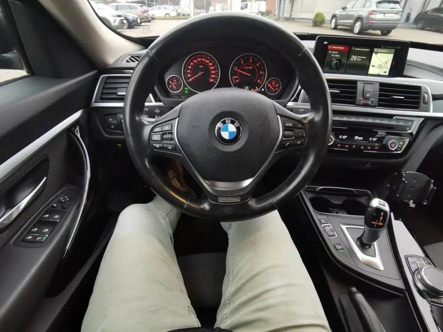Black BMW 320 2018 in Kuldiga, with an engine capacity of 2.00 L and mileage of 222 thousand km for 14490 €, photo 14 on AUTOMOTO.COM.LV