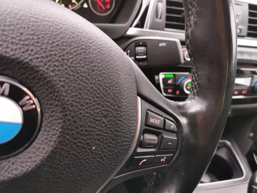 Black BMW 320 2018 in Kuldiga, with an engine capacity of 2.00 L and mileage of 222 thousand km for 14490 €, photo 22 on AUTOMOTO.COM.LV