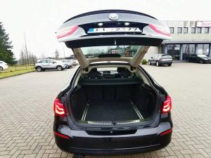 Black BMW 320 2018 in Kuldiga, with an engine capacity of 2.00 L and mileage of 222 thousand km for 14490 €, photo 26 on AUTOMOTO.COM.LV