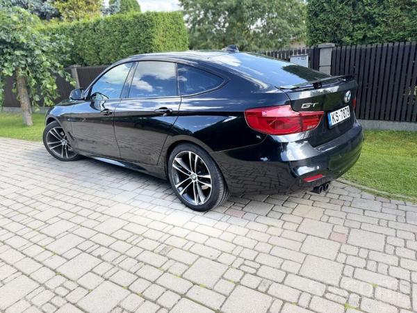 Black BMW 320 2018 in Riga, with an engine capacity of 2.00 L and mileage of 281 thousand km for 15000 €, photo 4 on AUTOMOTO.COM.LV