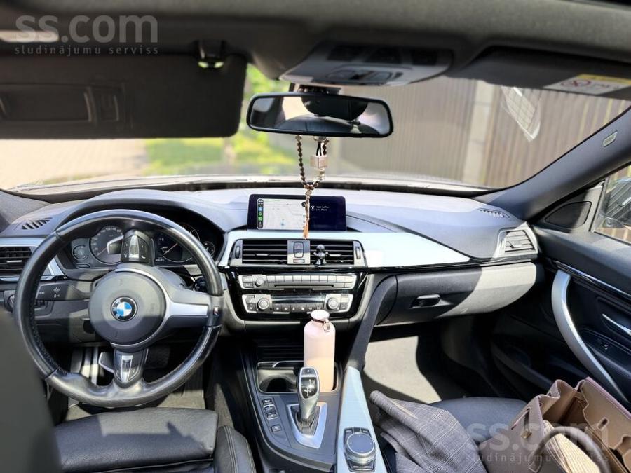 Black BMW 320 2018 in Riga, with an engine capacity of 2.00 L and mileage of 281 thousand km for 15000 €, photo 7 on AUTOMOTO.COM.LV