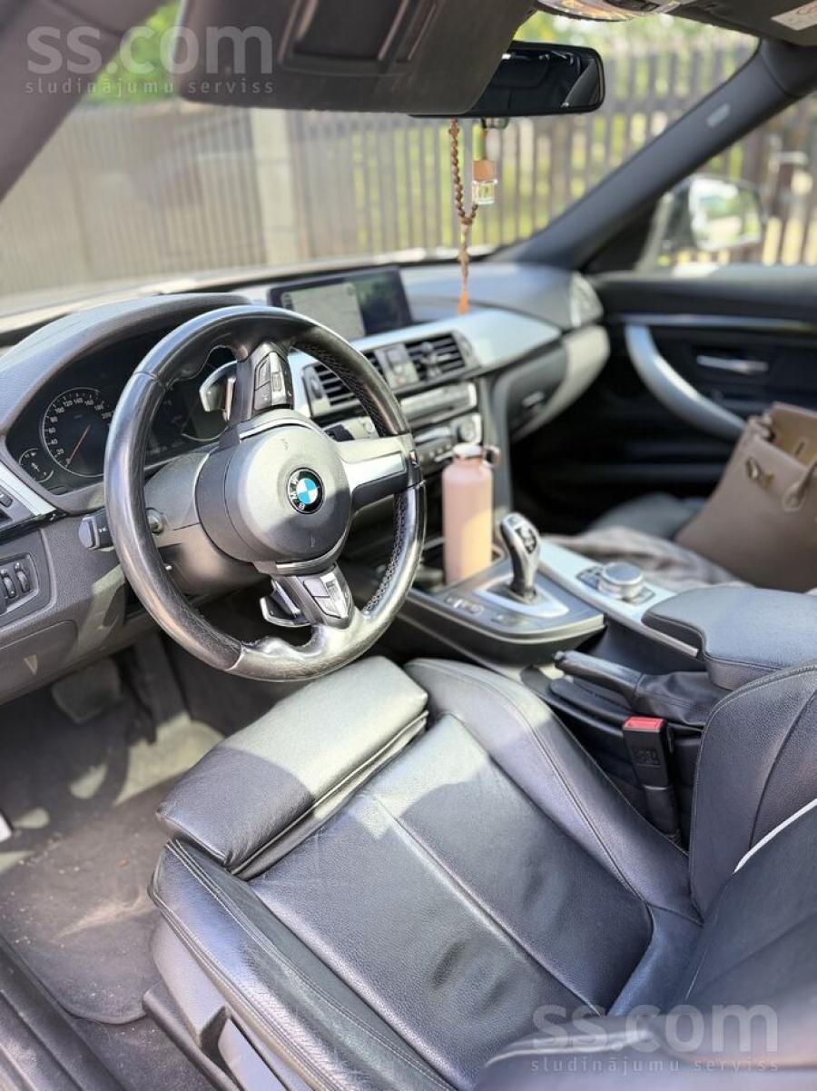 Black BMW 320 2018 in Riga, with an engine capacity of 2.00 L and mileage of 281 thousand km for 15000 €, photo 12 on AUTOMOTO.COM.LV
