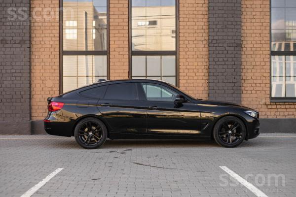 Black BMW 320 2019 in Riga, with an engine capacity of 2.00 L and mileage of 213 thousand km for 16990 €, photo 5 on AUTOMOTO.COM.LV