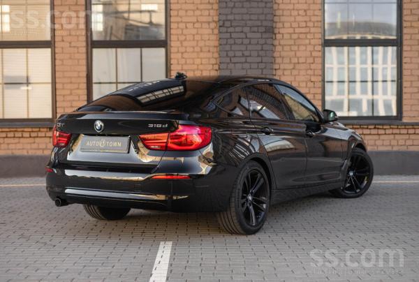 Black BMW 320 2019 in Riga, with an engine capacity of 2.00 L and mileage of 213 thousand km for 16990 €, photo 10 on AUTOMOTO.COM.LV