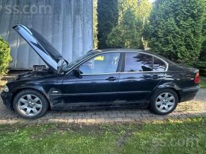 Black BMW 320 1998 in Riga, with an engine capacity of 2.00 L and mileage of 372 thousand km for 990 €, photo 4 on AUTOMOTO.COM.LV