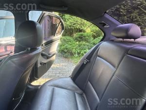 Black BMW 320 1998 in Riga, with an engine capacity of 2.00 L and mileage of 372 thousand km for 990 €, photo 5 on AUTOMOTO.COM.LV
