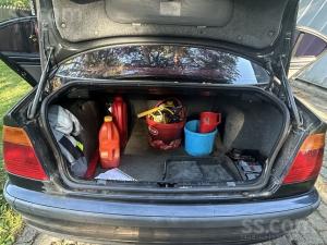 Black BMW 320 1998 in Riga, with an engine capacity of 2.00 L and mileage of 372 thousand km for 990 €, photo 14 on AUTOMOTO.COM.LV
