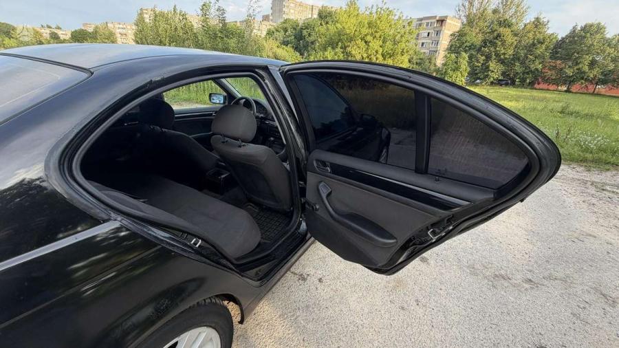 Black BMW 320 2002 in Vilnius, with an engine capacity of 2.00 L and mileage of 318 thousand km for 1550 €, photo 18 on AUTOMOTO.COM.LV