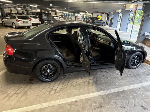 Black BMW 320 2007 in Riga, with an engine capacity of 2.00 L and mileage of 240 thousand km for 8990 €, photo 8 on AUTOMOTO.COM.LV