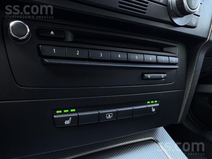 Black BMW 320 2008 in Riga, with an engine capacity of 2.00 L and mileage of 390 thousand km for 5390 €, photo 22 on AUTOMOTO.COM.LV